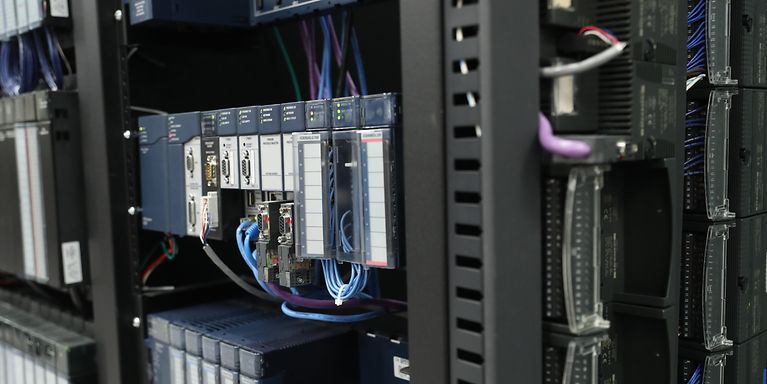 PLC vs. PAC: Choosing the Right Industrial Control System Architecture ...
